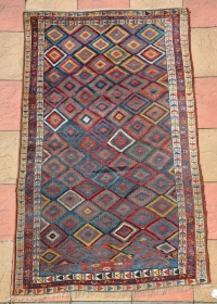 rugrabbit.com | Antique Rugs and Carpets | Asian Art | Tribal Art